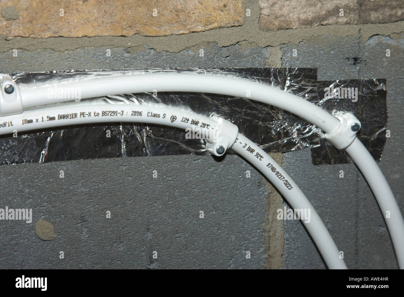 Speedfit polyethylene water pipes installed in a new house to connect ...