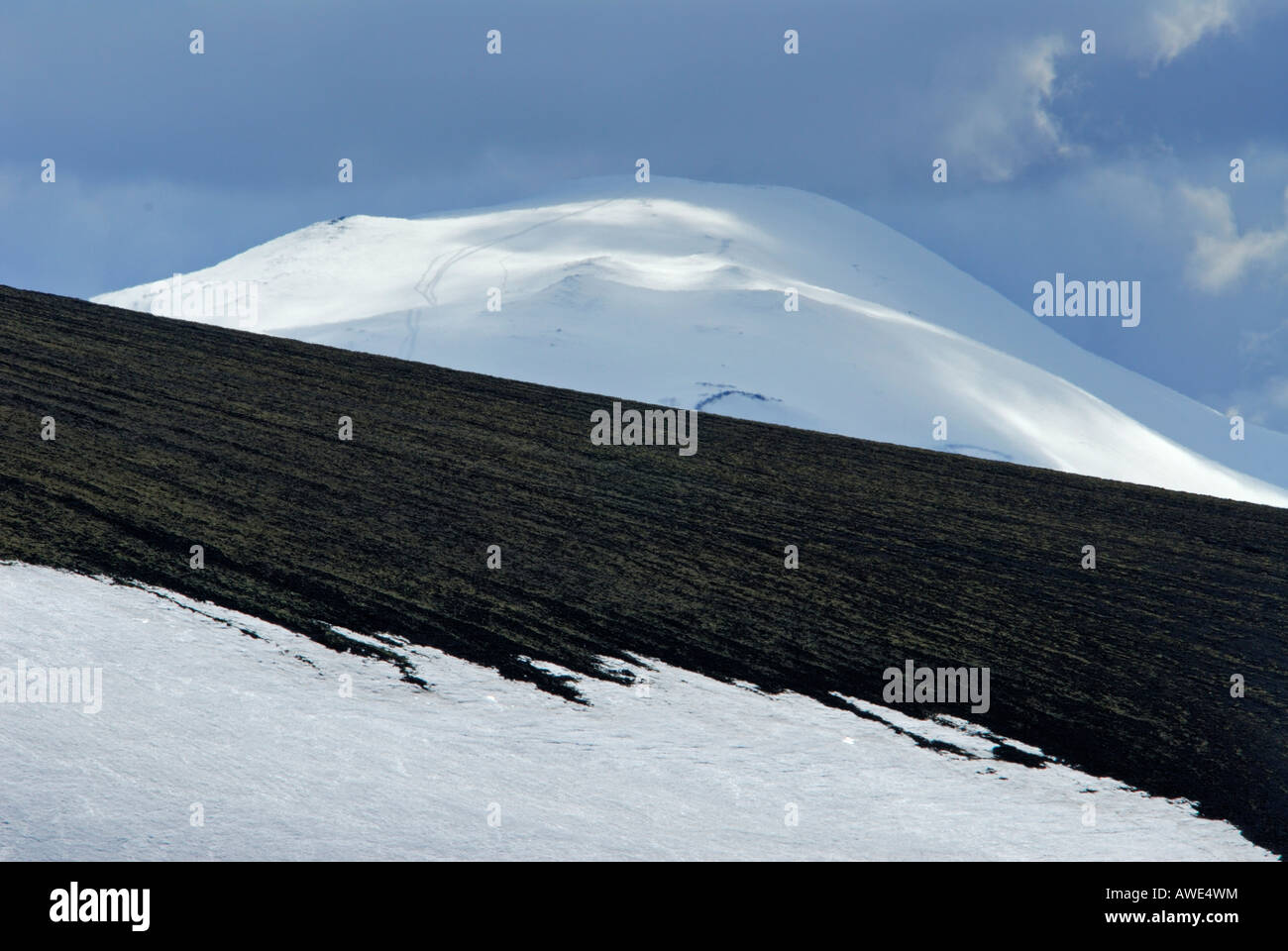 Black lava and snow in the volcanic landscape of Mt Hekla Iceland Stock ...