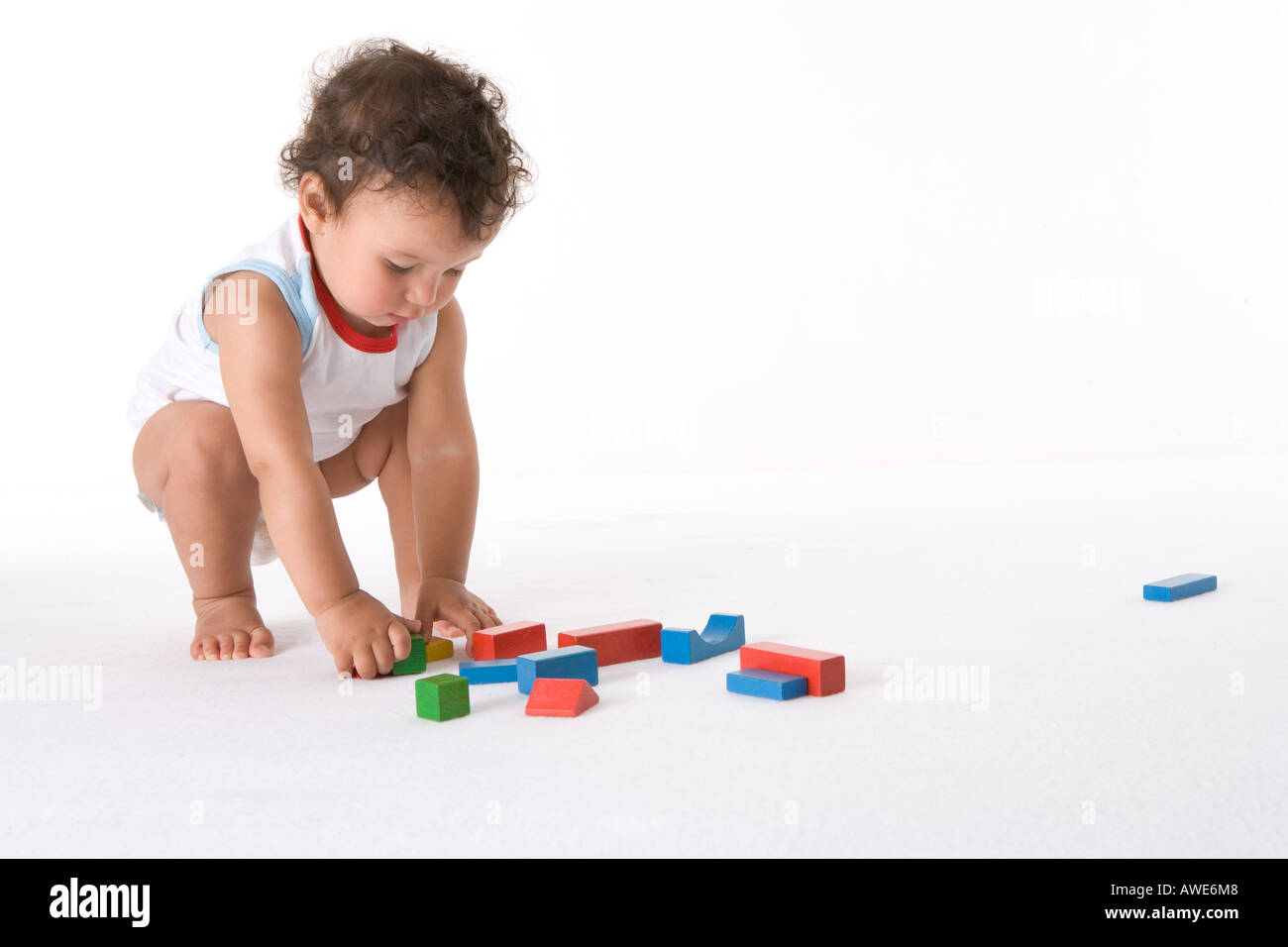 Little boy is playing with bricks Stock Photo - Alamy