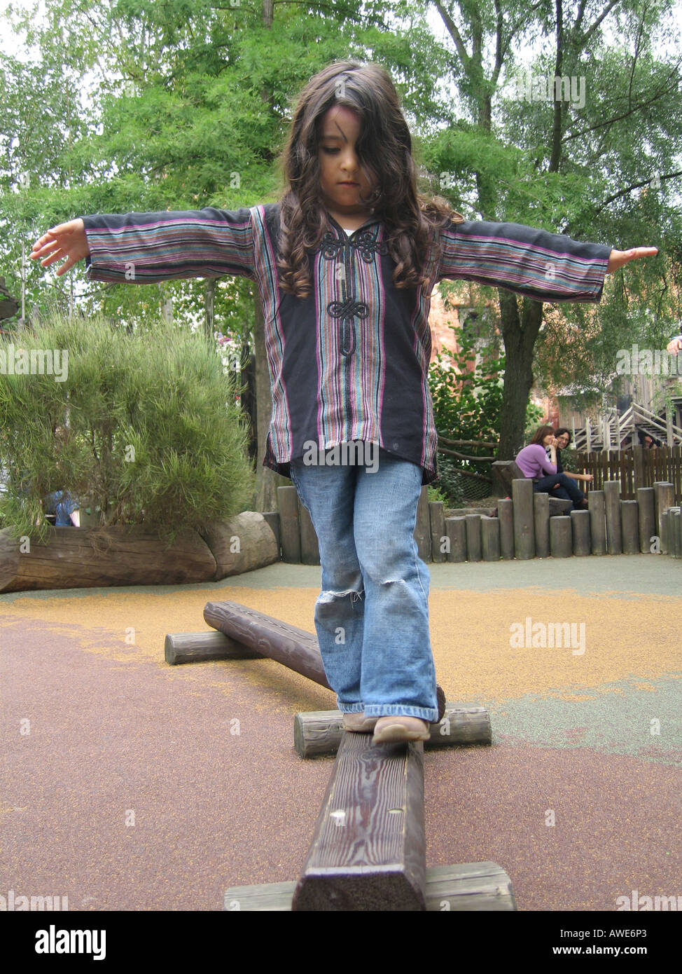 Girl on a balance beam Stock Photo - Alamy