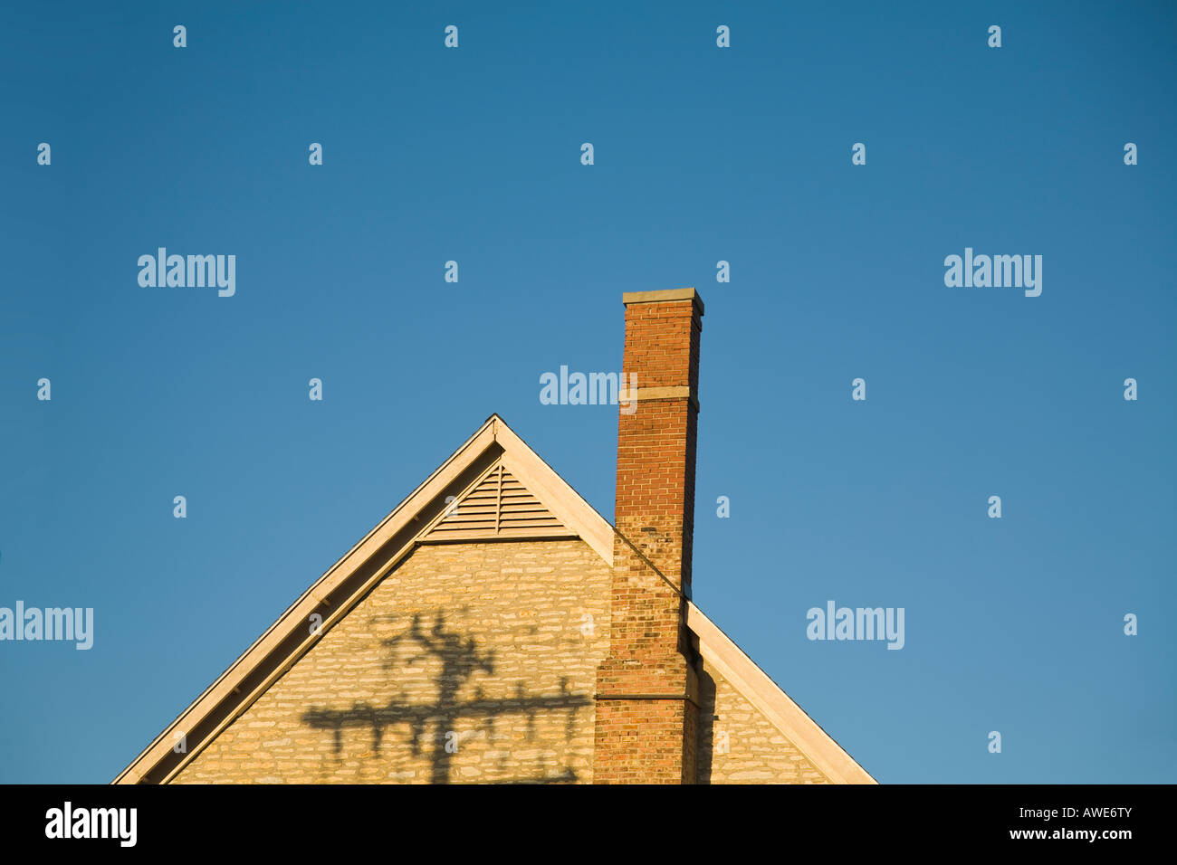 ILLINOIS Dixon Shadow of utility pole and line on side of wooden house ...