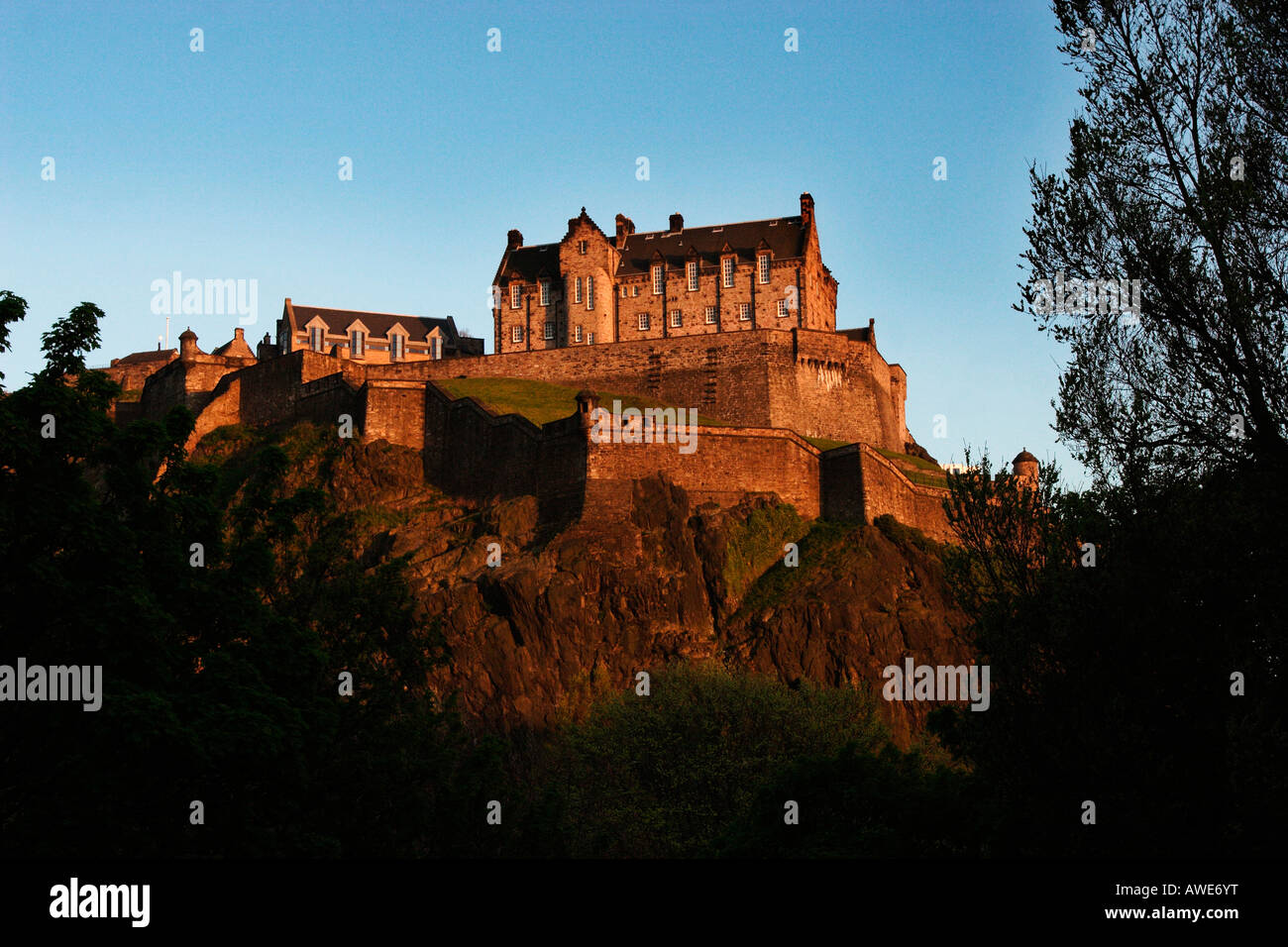 Edinburgh castle at sunset Stock Photo - Alamy