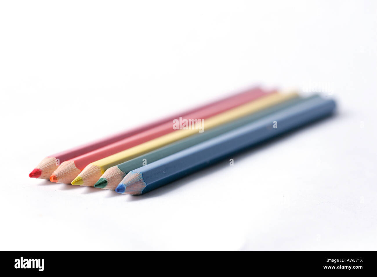 Pencil crayons lined up together Stock Photo - Alamy