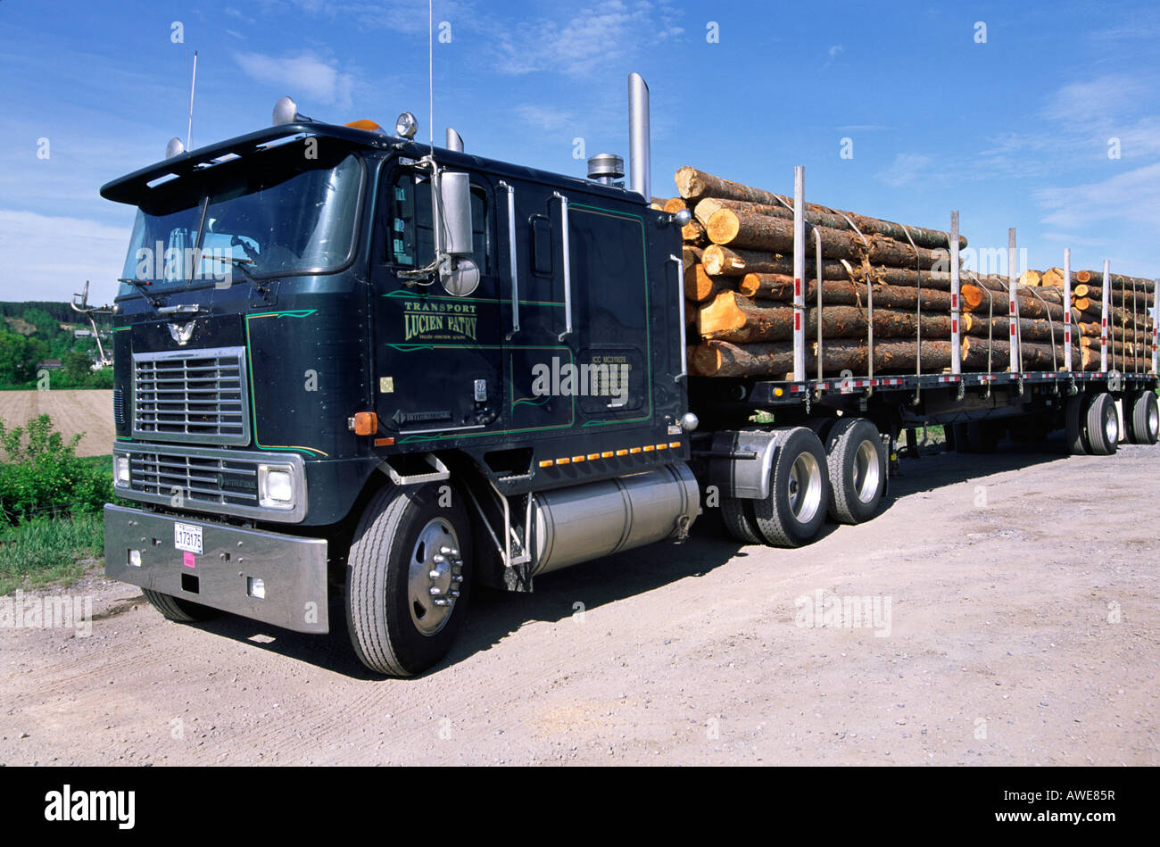 Logging truck Quebec Canada Stock Photo - Alamy