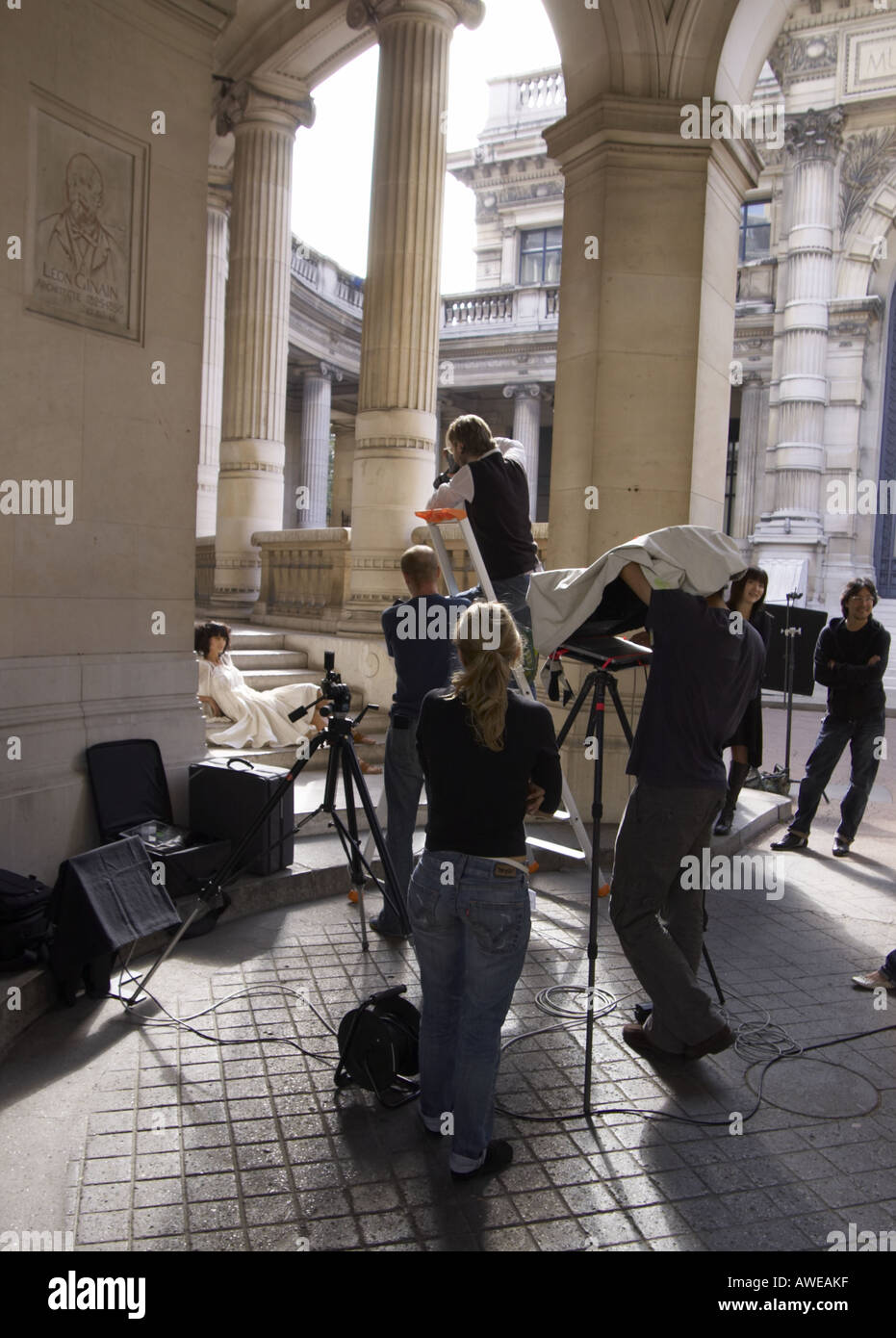 a fashion model photoshoot in progress at Palais Galleria in paris ...