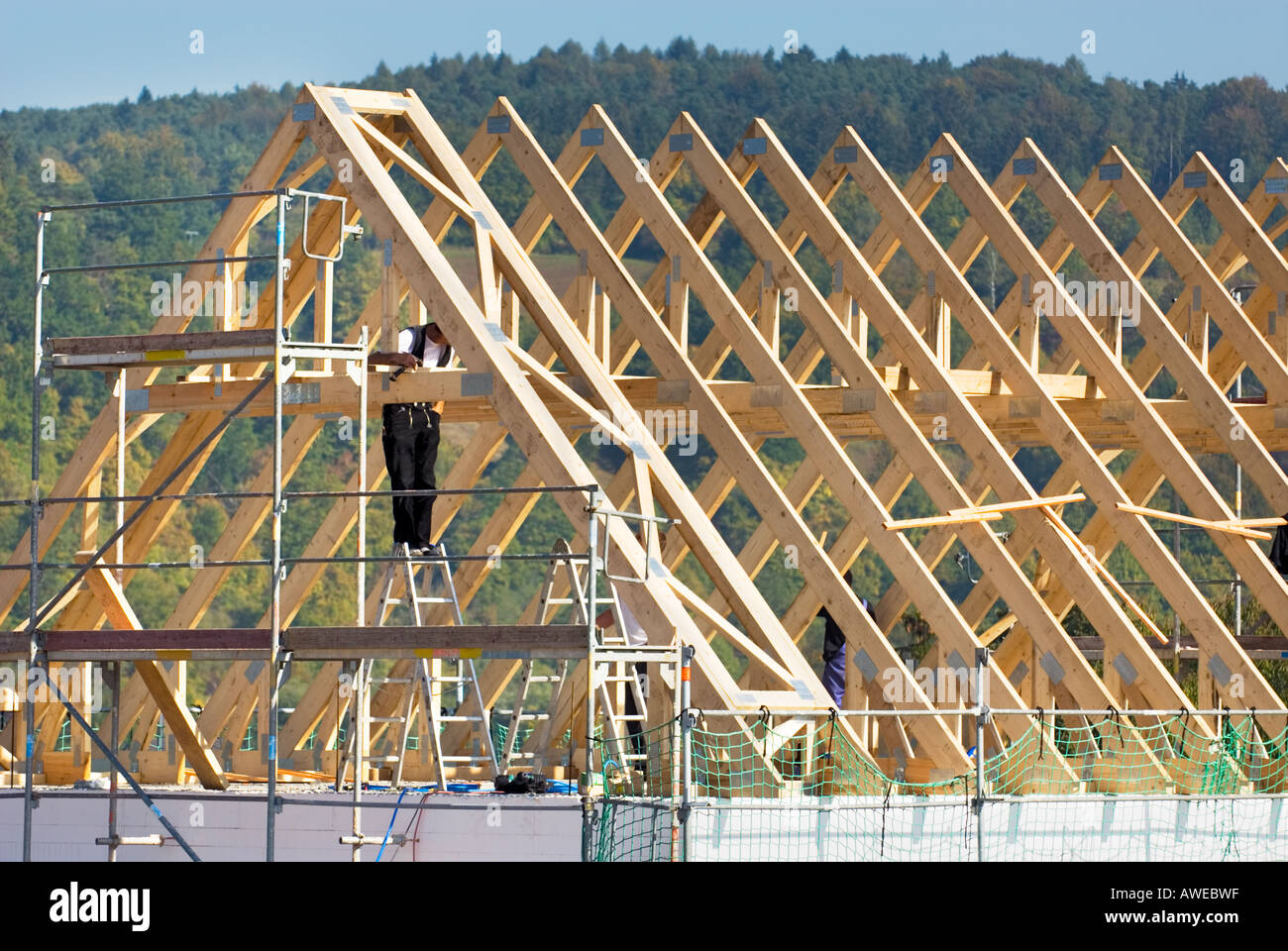 roof truss timbers Construction site brick wall cement gray concrete ...