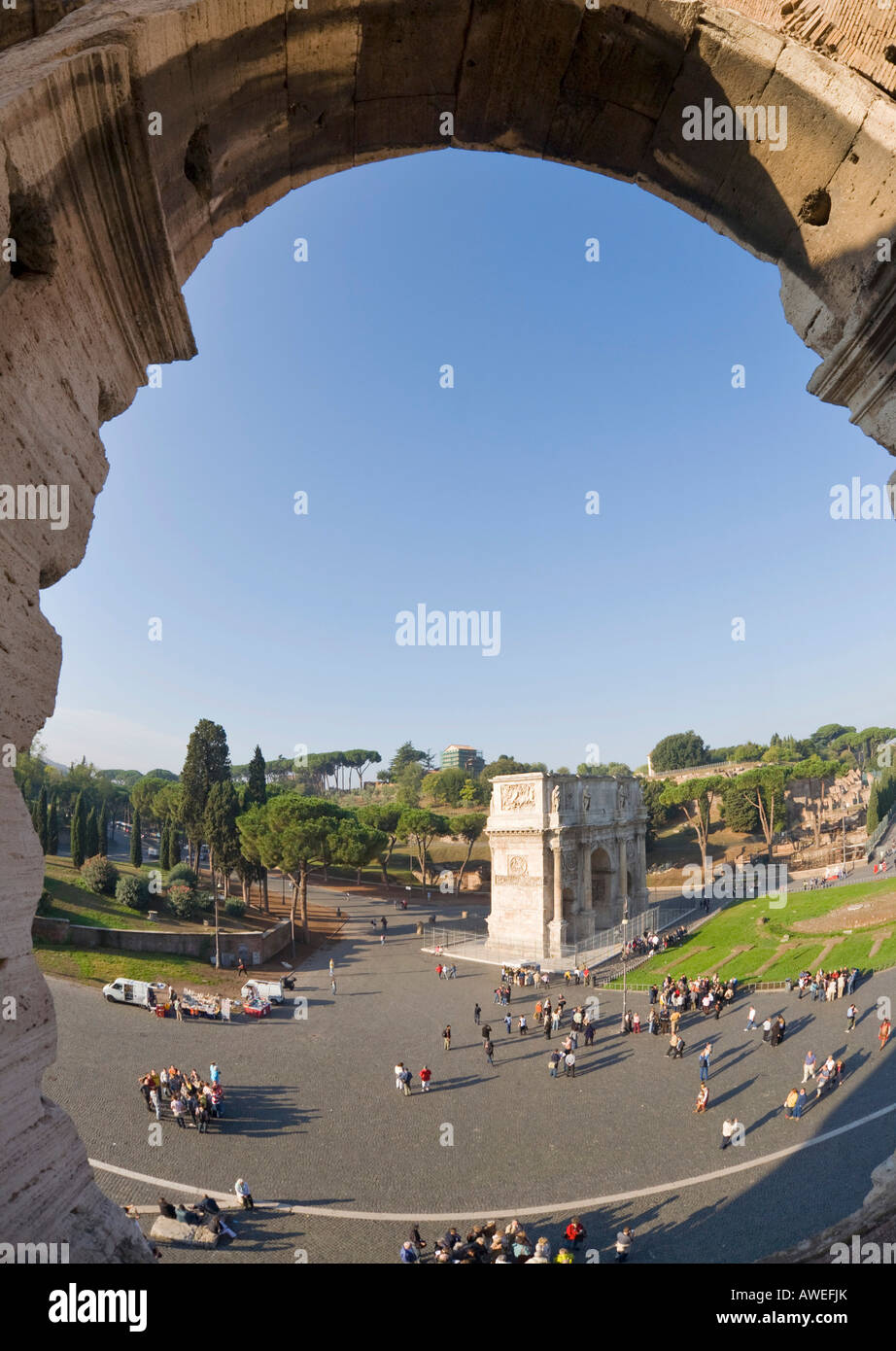 Arch of Constantine seen through a Colosseum arcade, Rome, Italy ...