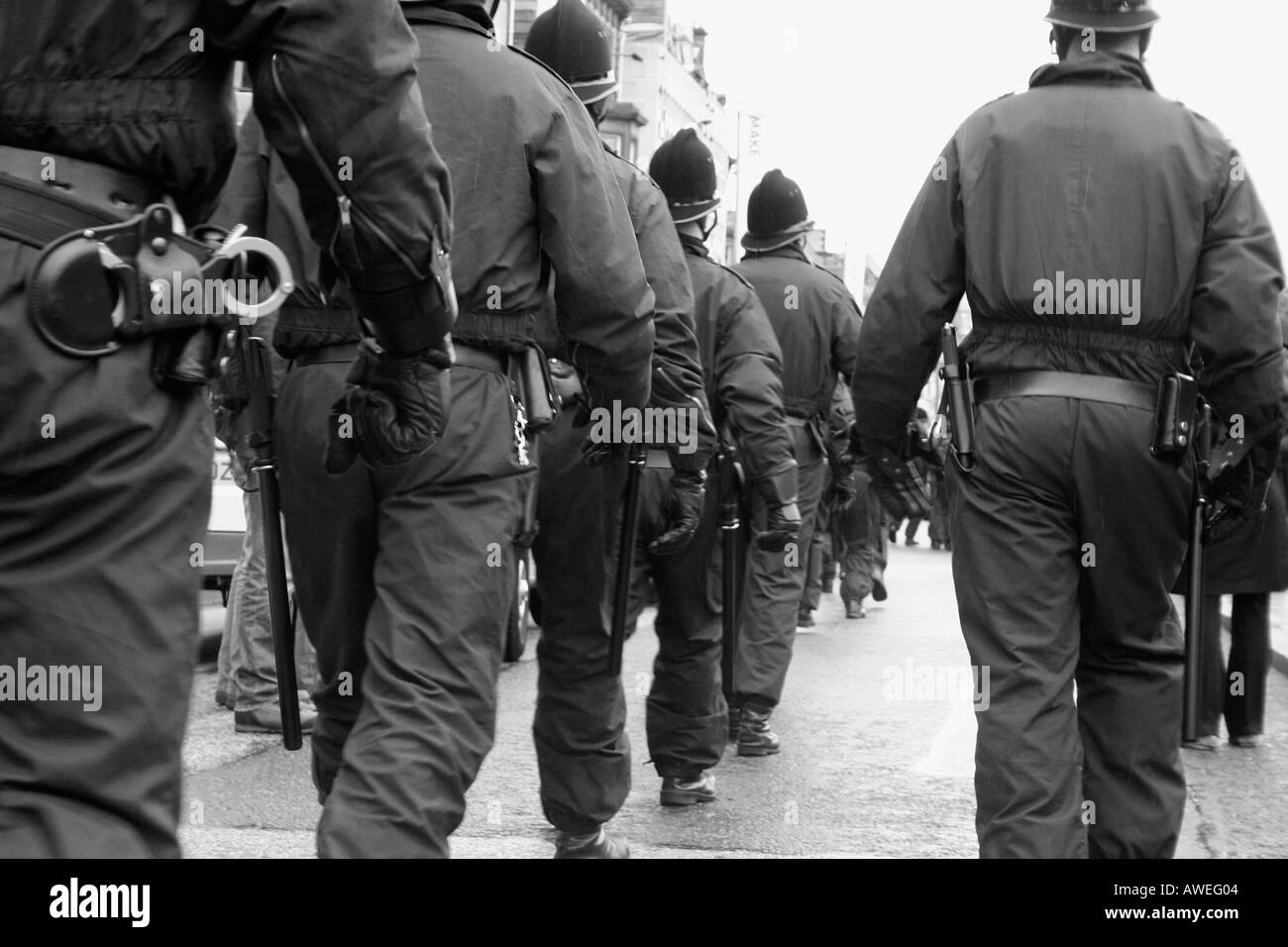 Marching police black Black and White Stock Photos & Images - Alamy