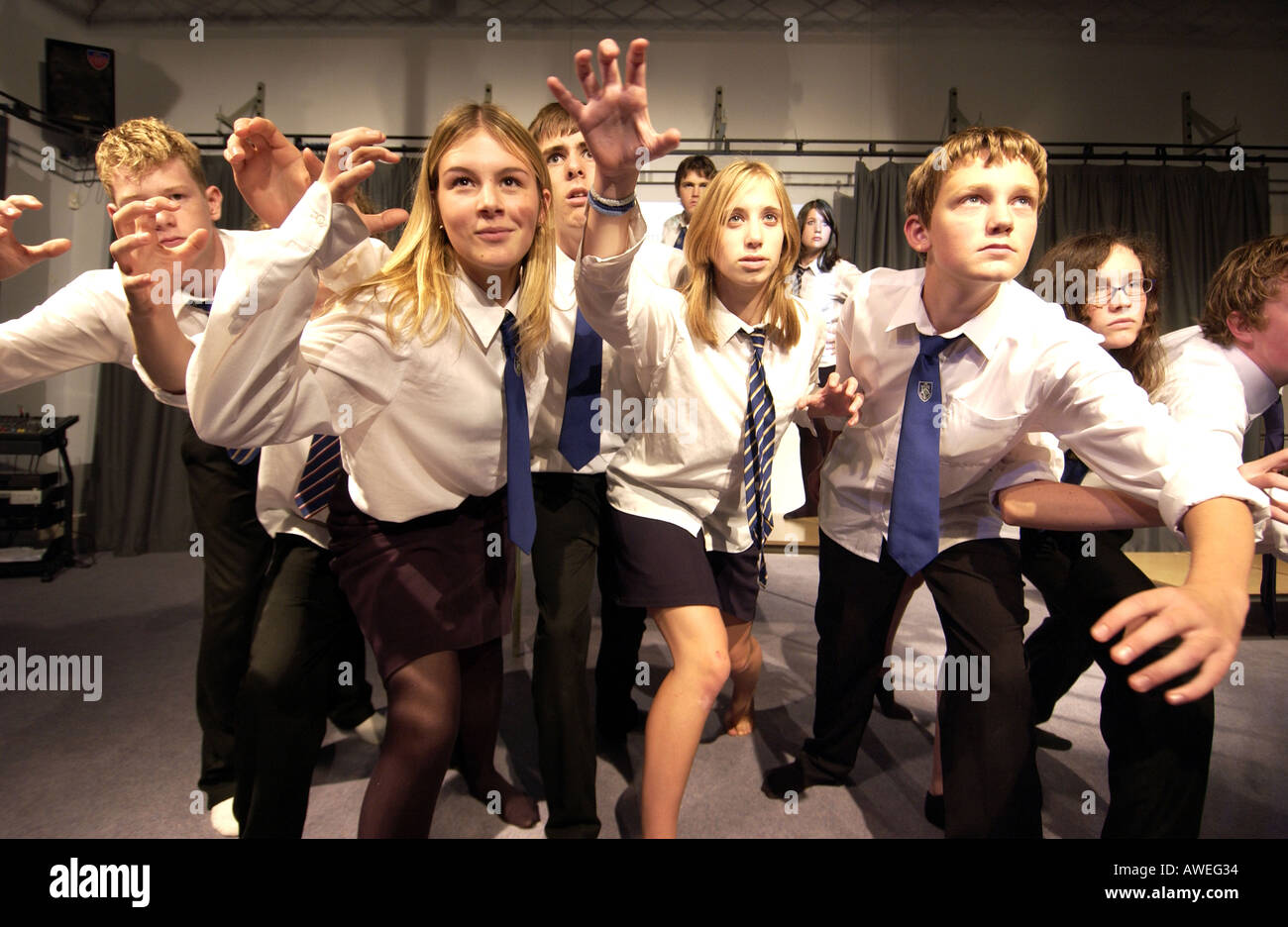 Teenagers in school uniforms in a drama class Stock Photo - Alamy