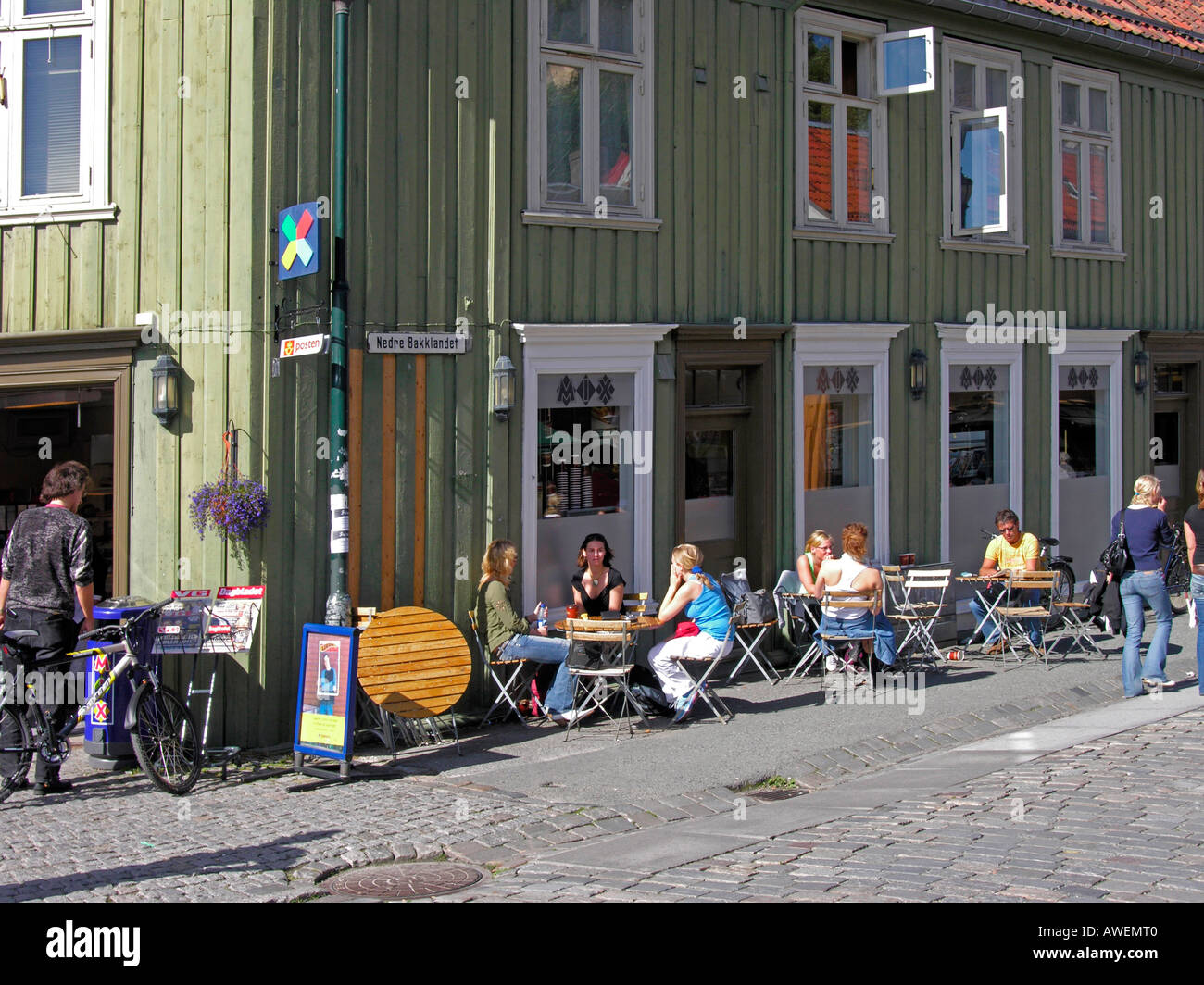 Trondheim street lane with storefronts facades of old timber houses ...