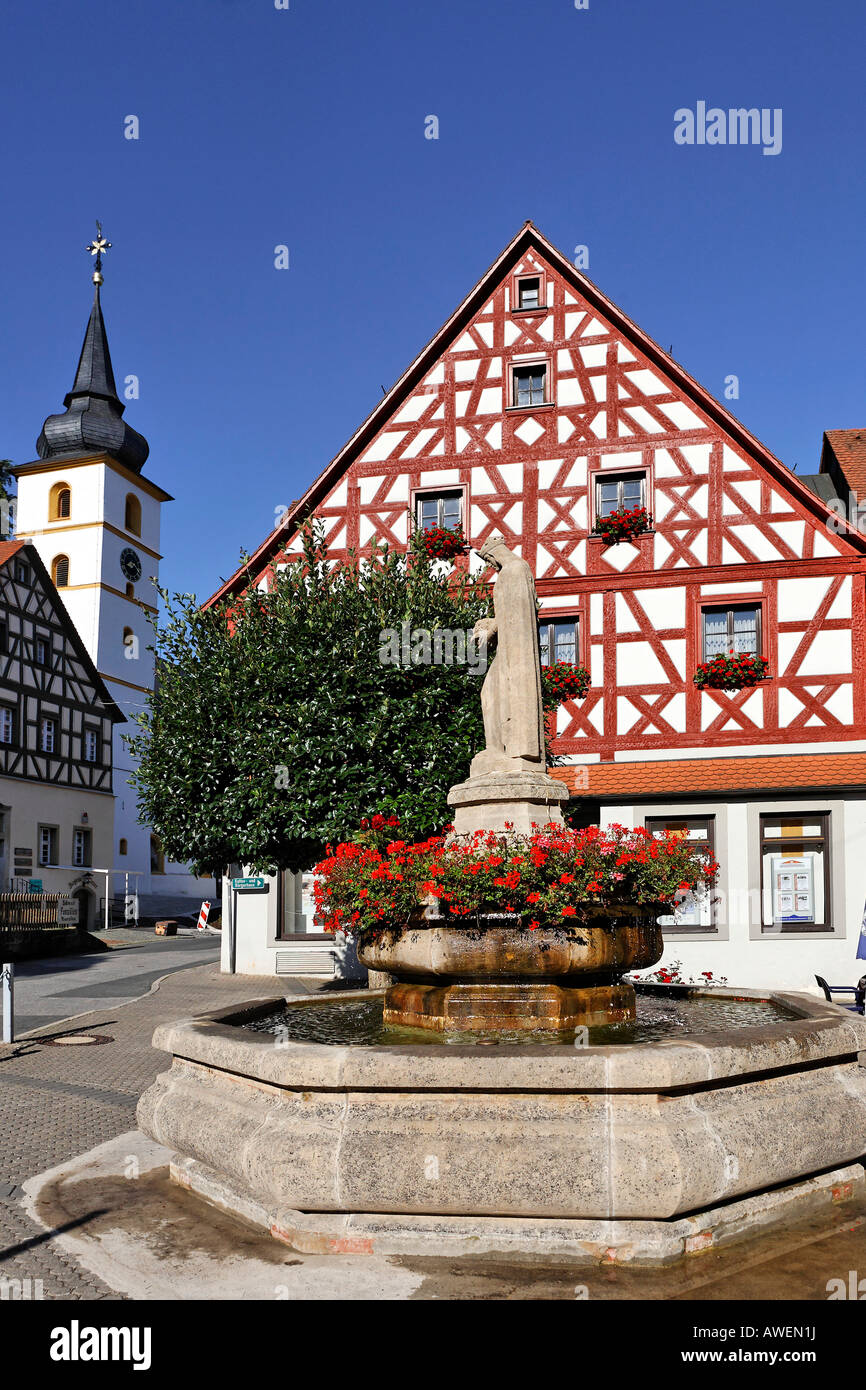 Main square with Elizabeth Fountain and Fachwerk-style houses ...