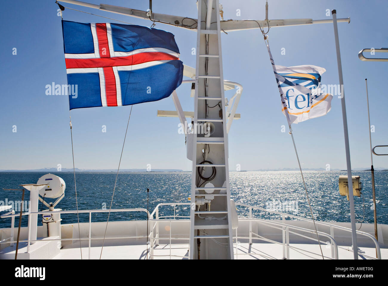 Icelandic flag on a ferry travelling between the Western Fjords and ...