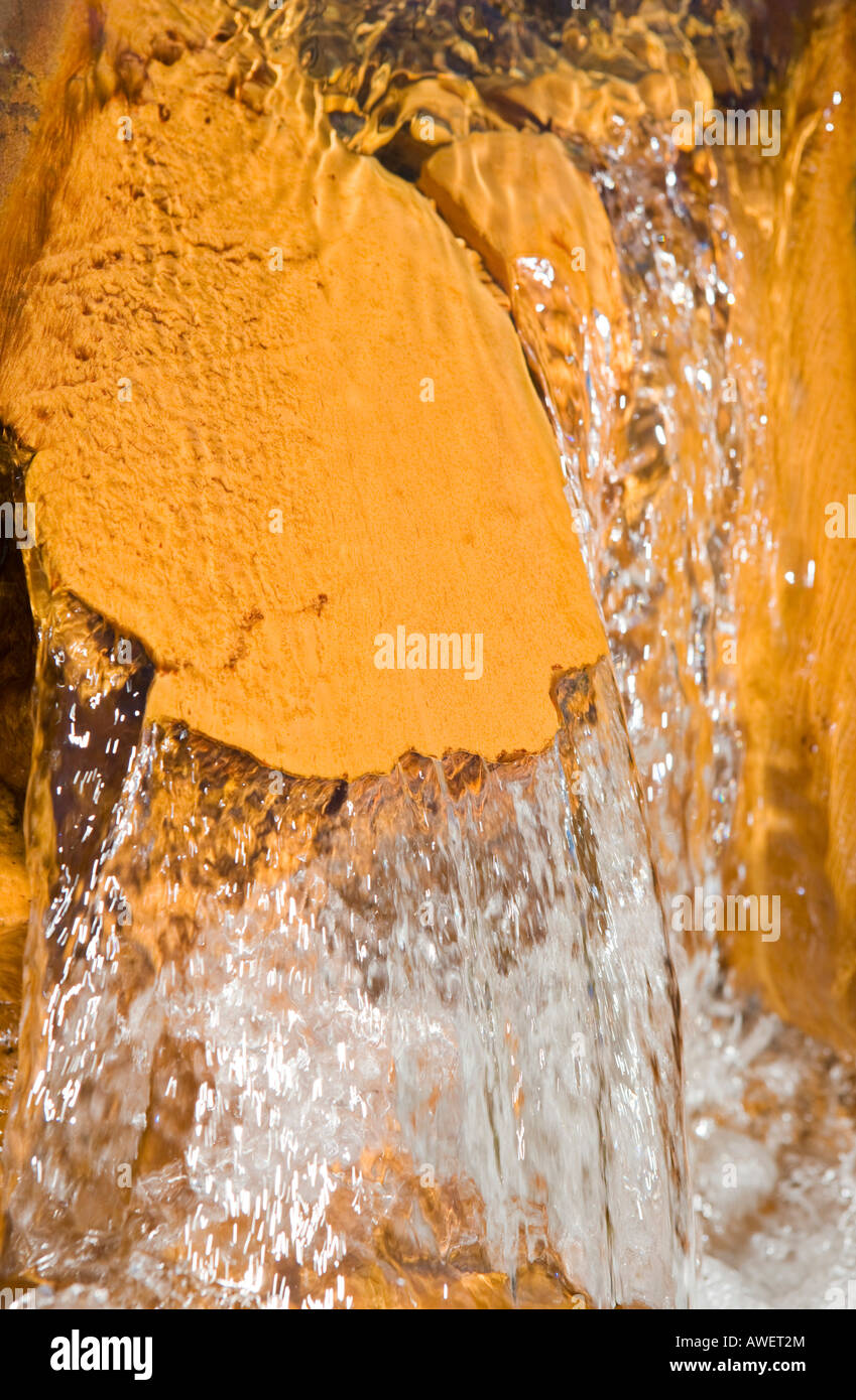 Rust-coloured stream bed coloured from iron deposits, Selvellir ...