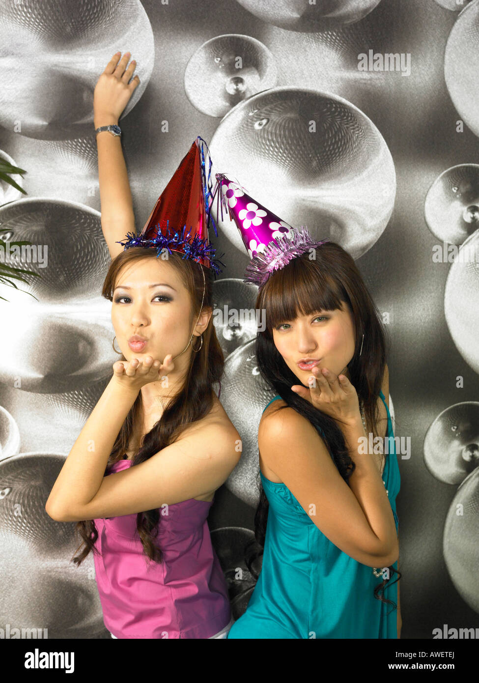 two young women dancing in the party Stock Photo - Alamy