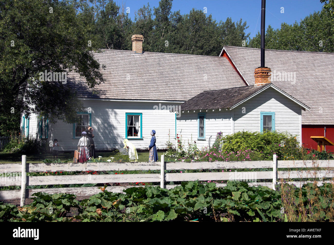 An historic house and barn together at the Mennonite Heritage Village ...