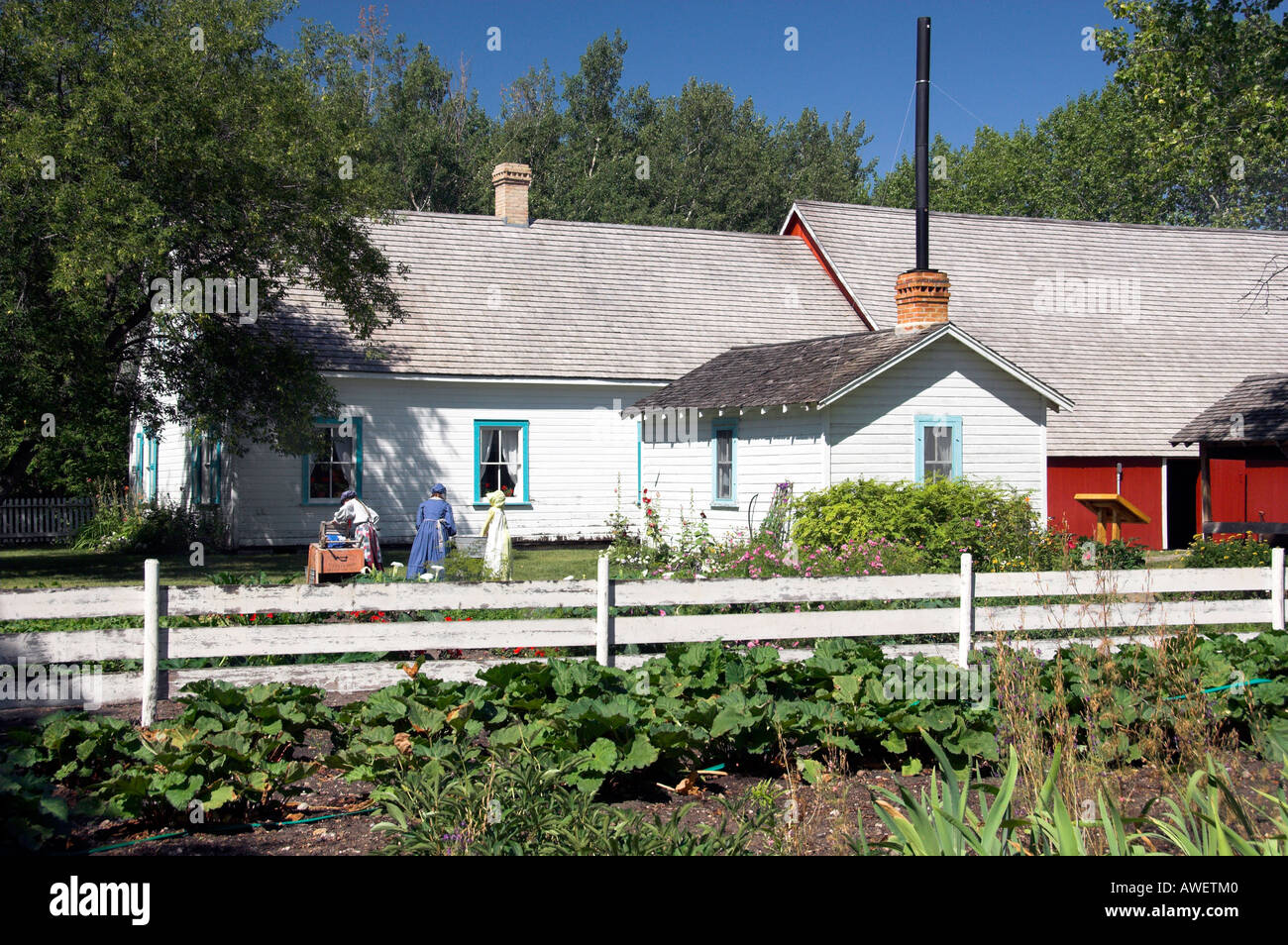 An historic house and barn together at the Mennonite Heritage Village ...