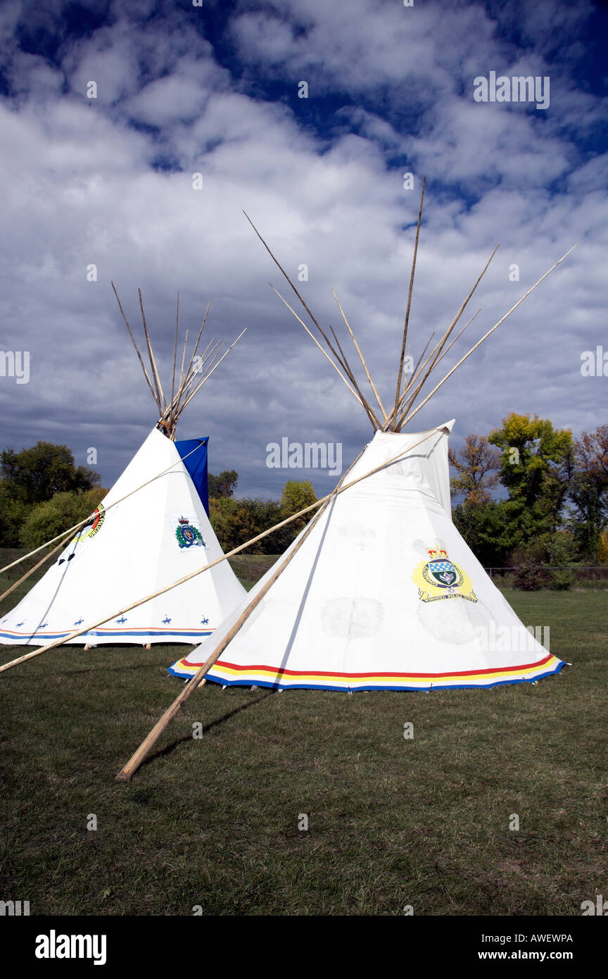 Two white teepees at an aboriginal gathering near Winnipeg Manitoba ...