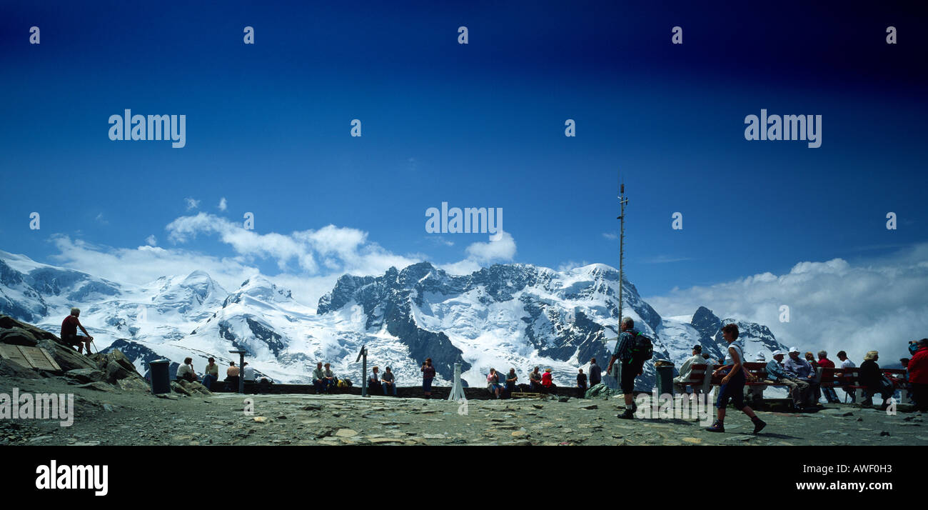Tourist at the summit of the Gornergrat above Zermatt in the Swiss alps ...
