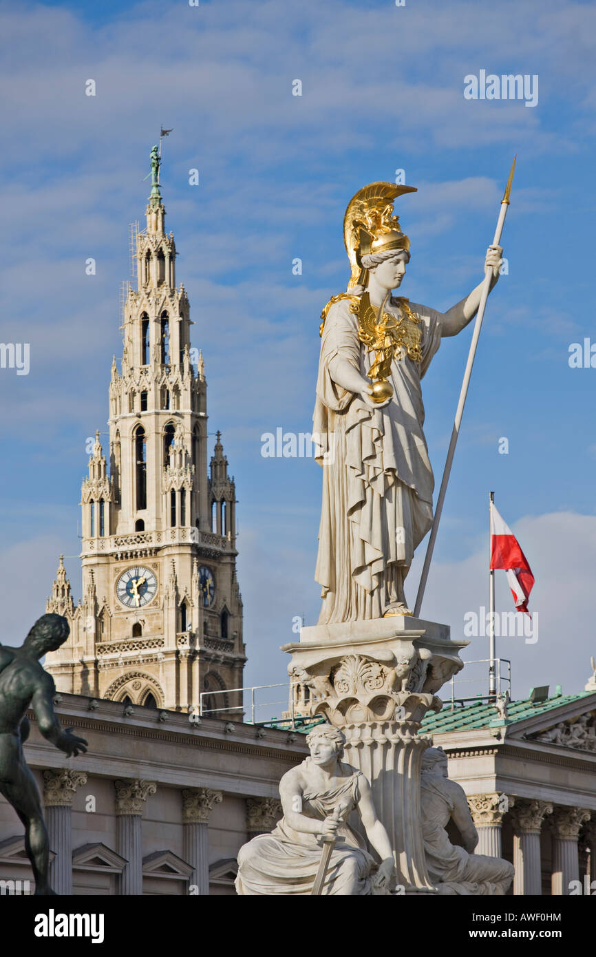 Athena statue in front of the parliament building, city hall tower in ...