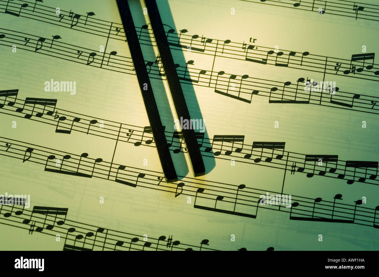 tuning fork with sheet music Stock Photo - Alamy