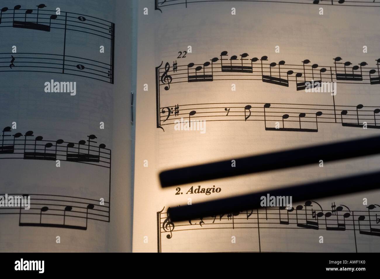 tuning fork with sheet music Stock Photo - Alamy