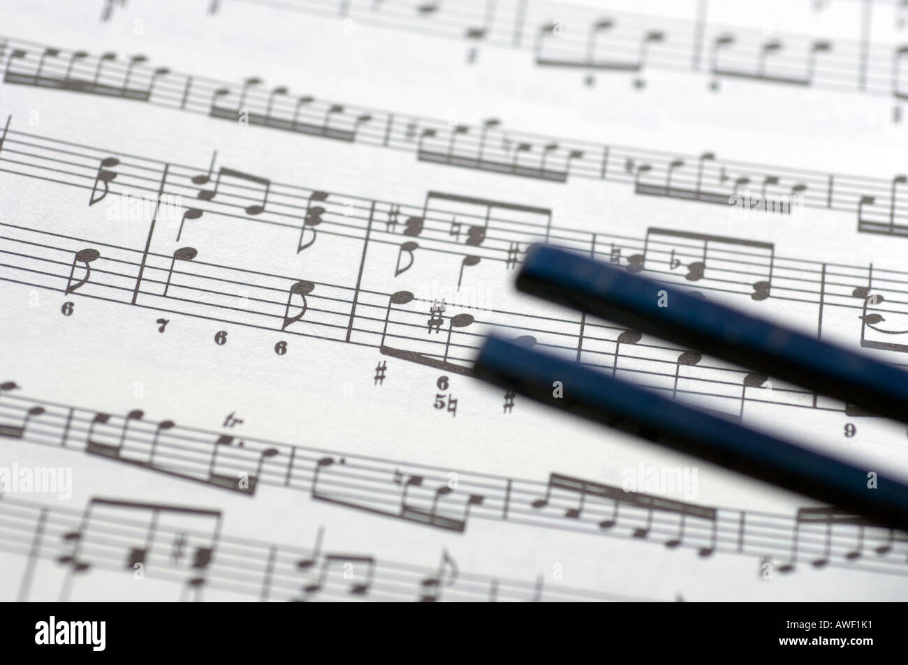 tuning fork with sheet music Stock Photo - Alamy