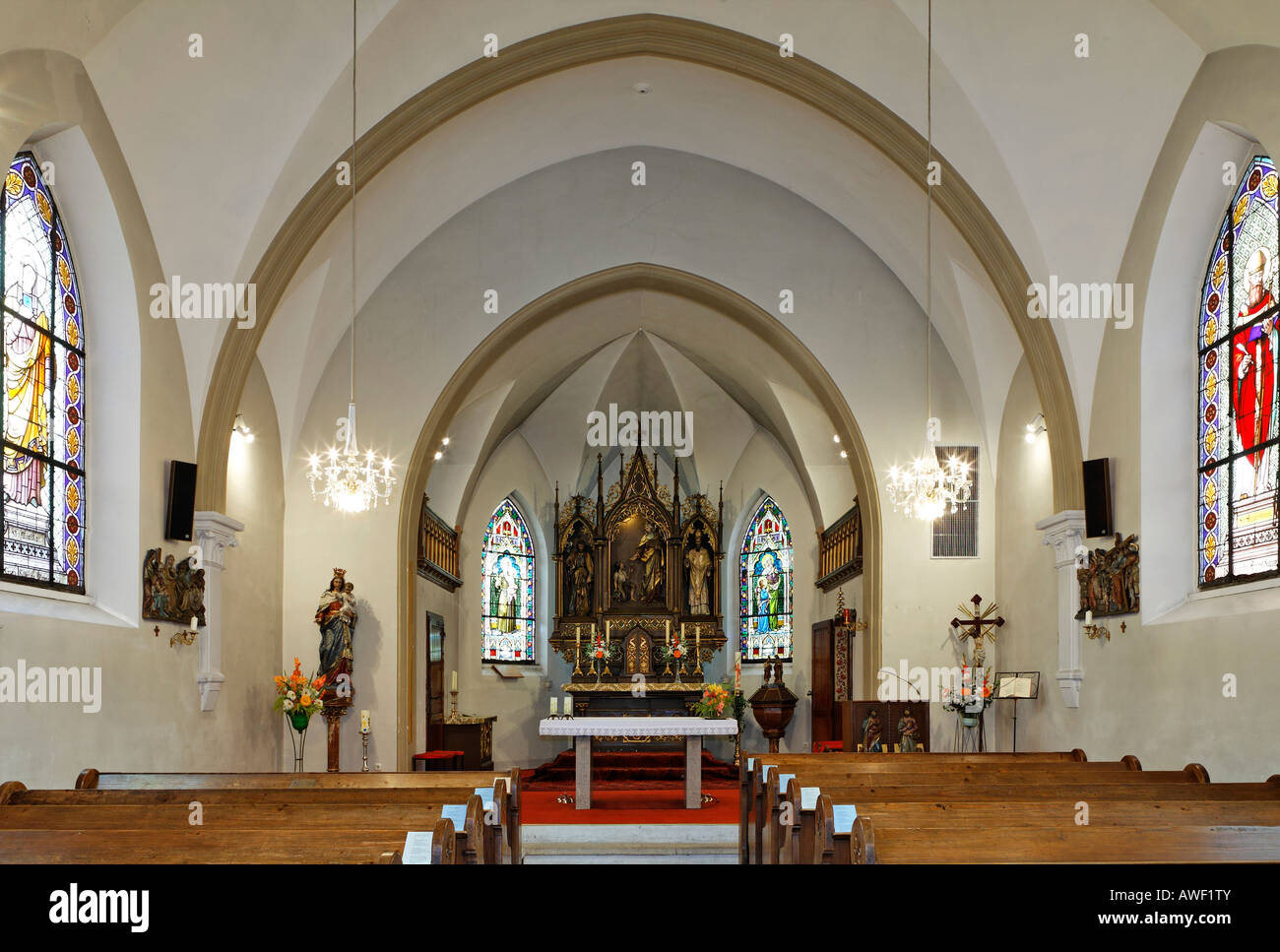 Neo-Gothic carved altar at the church in Hirtenberg, Triesingtal ...