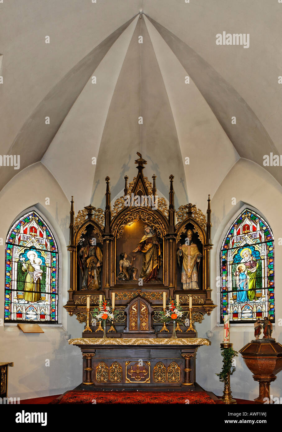 Neo-Gothic carved altar at the church in Hirtenberg, Triesingtal ...