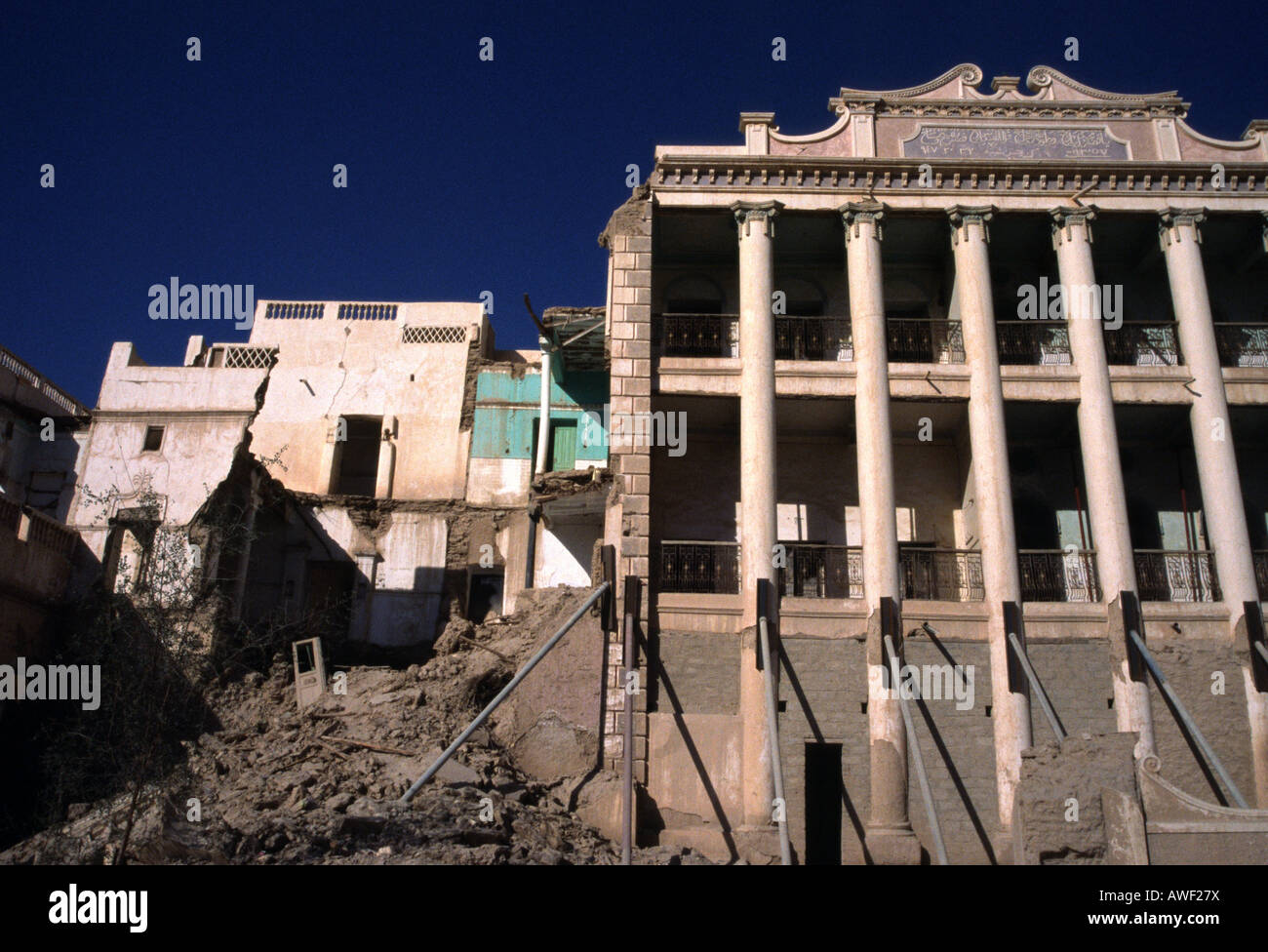 A crumbling mud brick palace in the Javanese baroque style Tarim Yemen ...