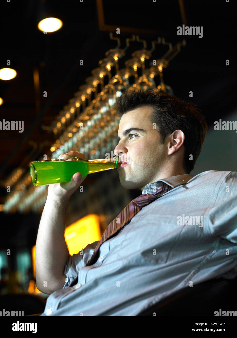 man relax and drinking at bar counter Stock Photo - Alamy