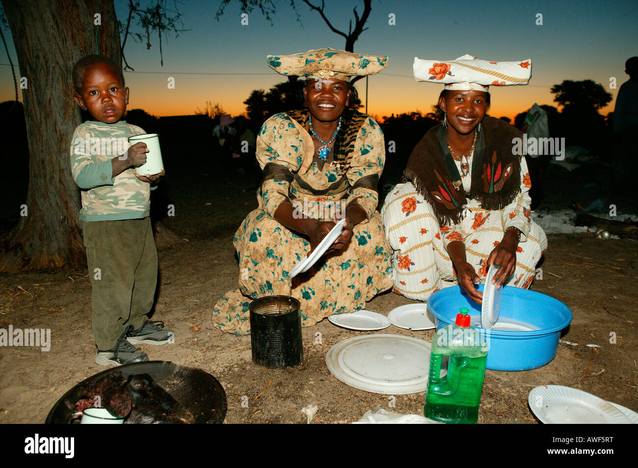 African Woman Washing Dishes Smiling High Resolution Stock Photography ...