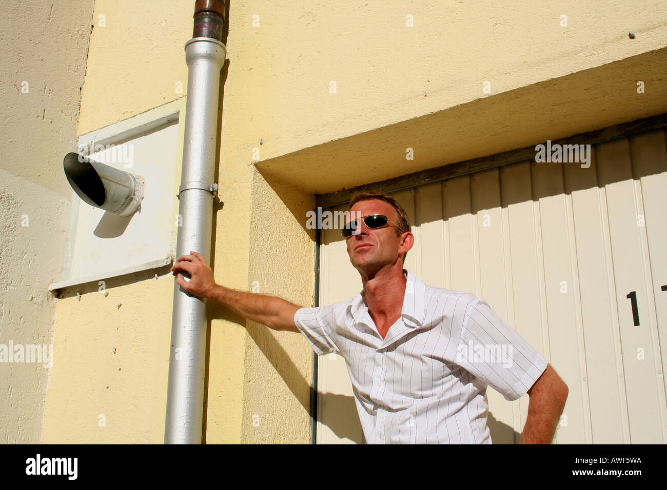 man with shades staring into the sun Stock Photo - Alamy