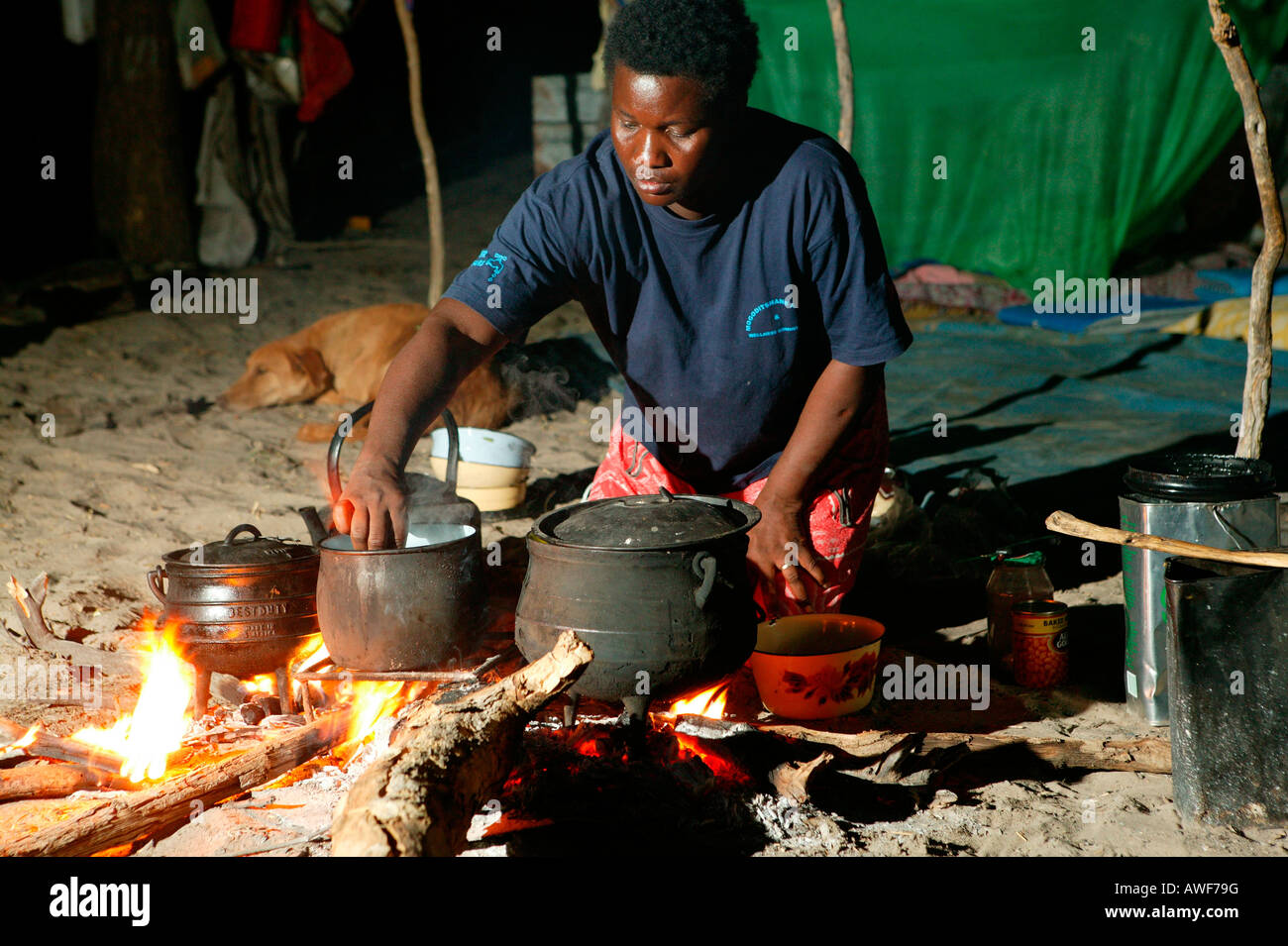 Woman cooking at the campfire, Cattlepost Bothatogo, Botswana, Africa ...