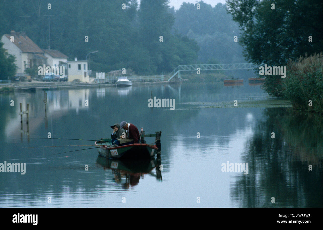 Bourgogne France Boat On Canal De Midi Father and Son Fishing from Boat ...