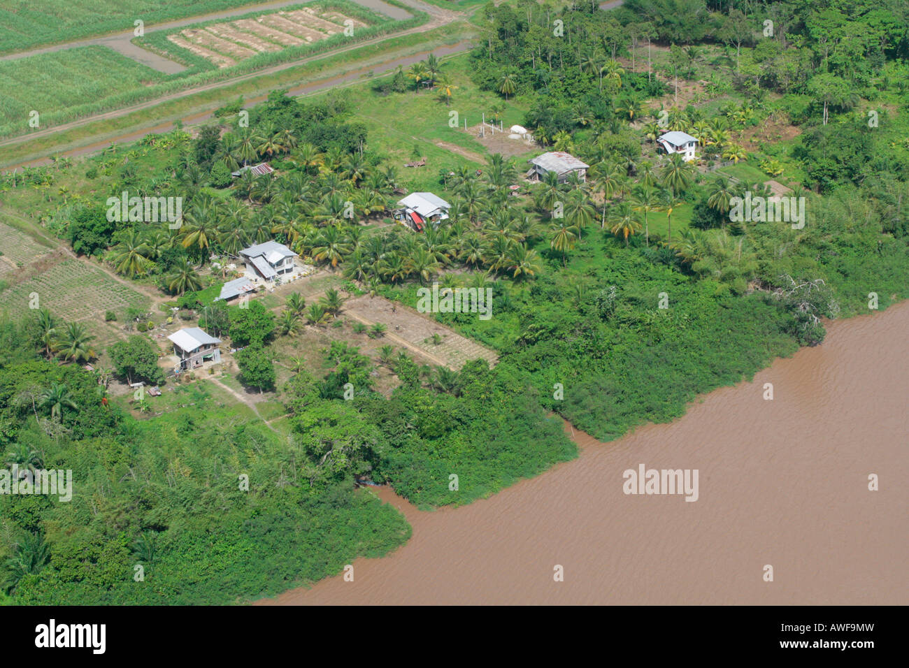 Aerial view of a housing development on the banks of the Demerara River ...