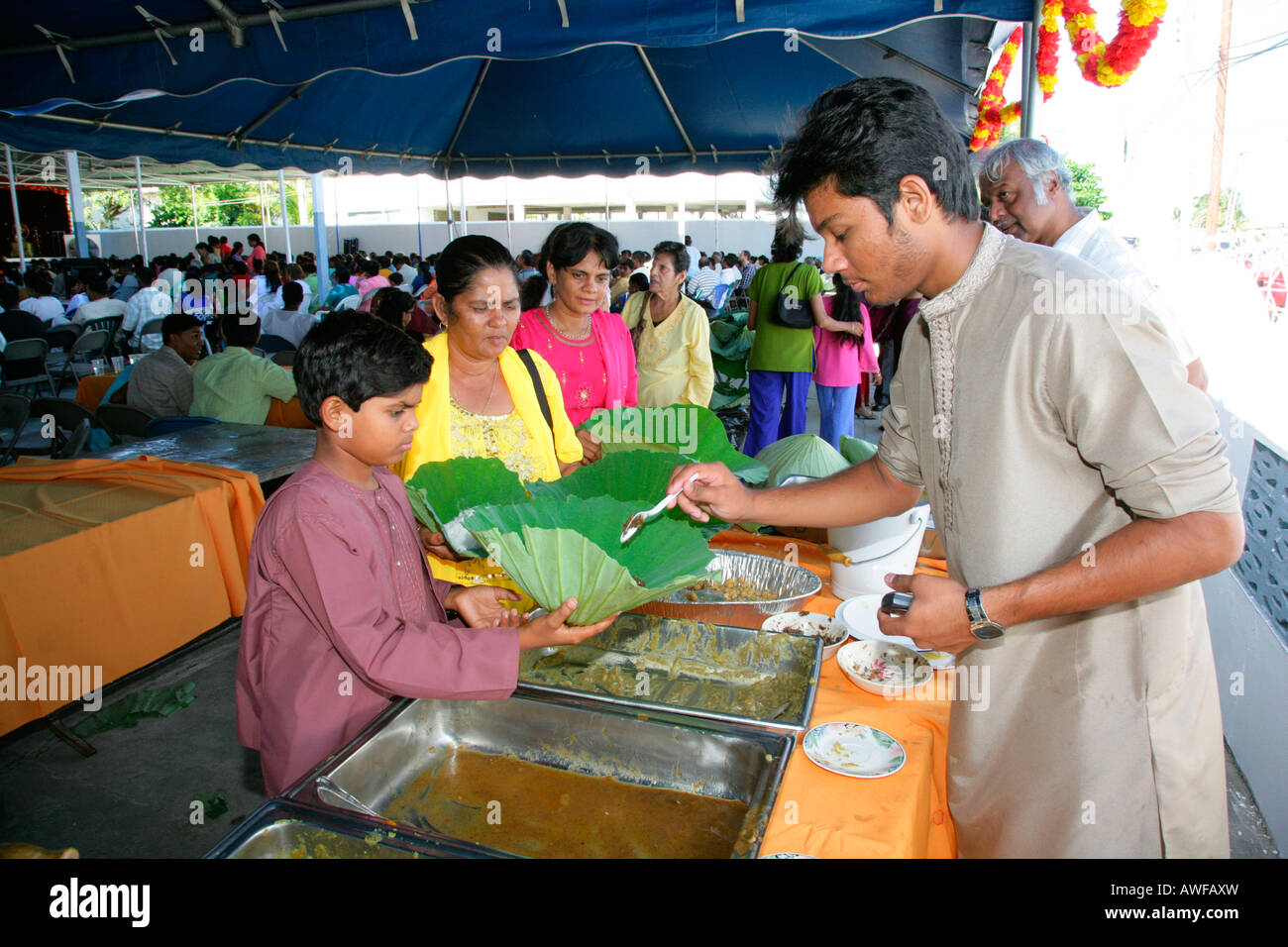 Indian child eating rice hi-res stock photography and images - Alamy