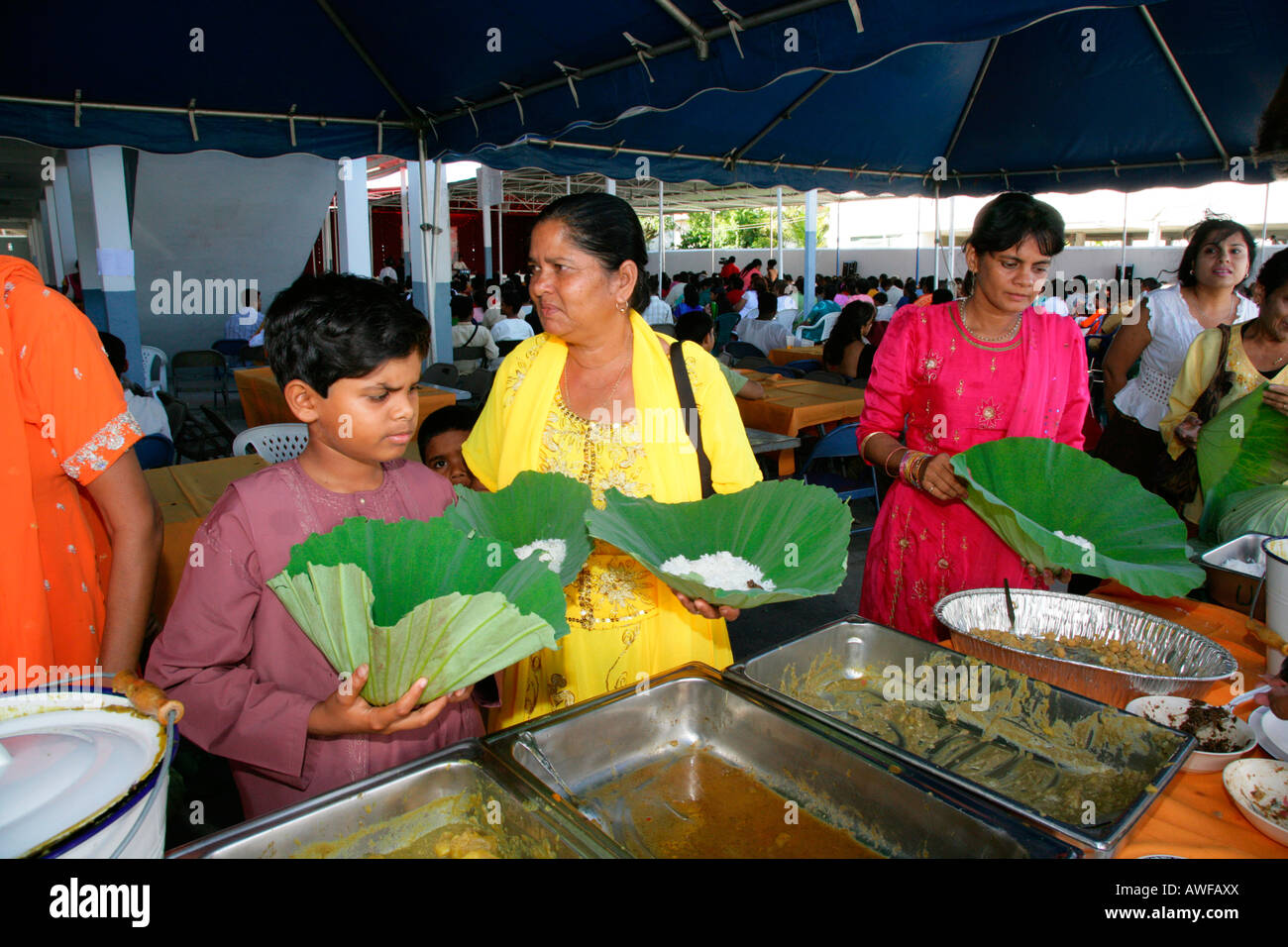 Indian child eating rice hi-res stock photography and images - Alamy