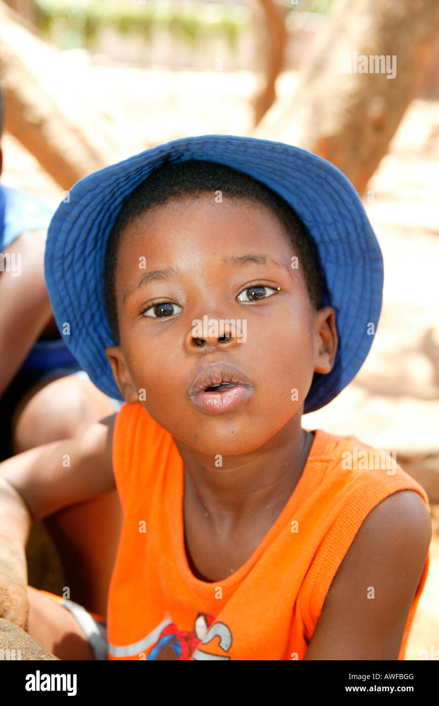 Boy wearing blue hat, Gaborone, Botswana, Africa Stock Photo - Alamy