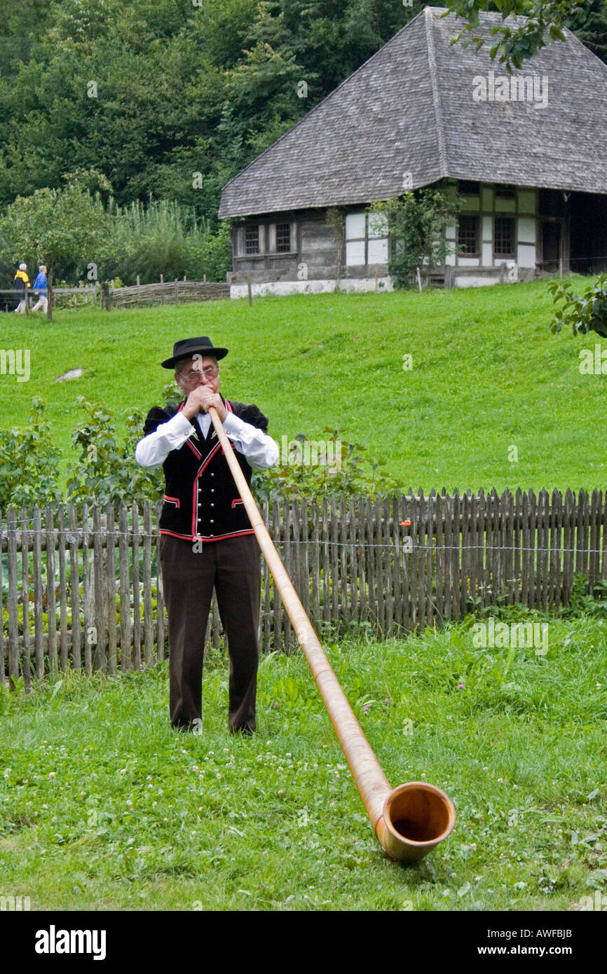 Alpine Horn blowing at Ballenburg Open Air Museum of Rural Culture near ...
