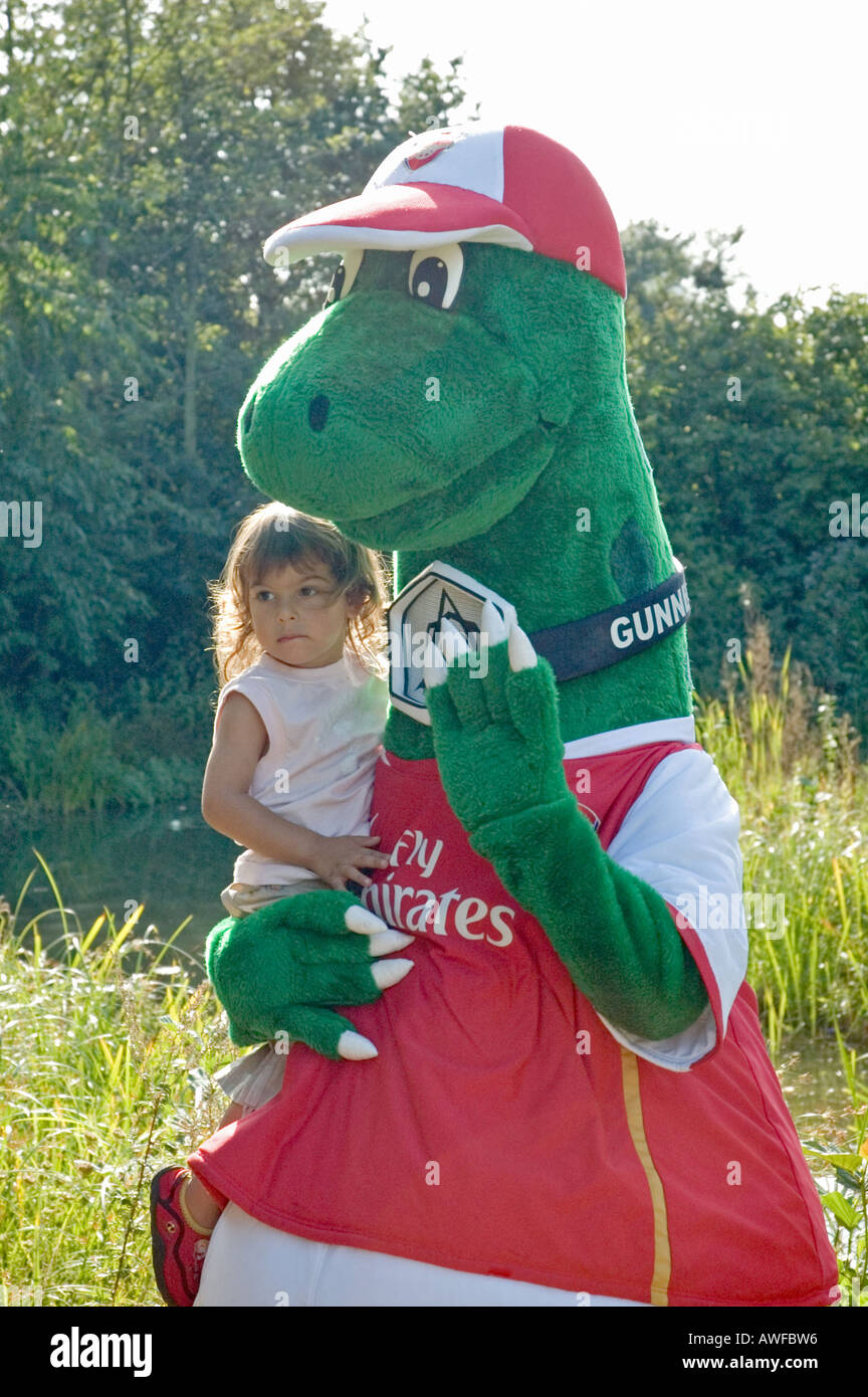 Gunnersaurus Arsenal s mascot holding a little girl at the Gillespie ...