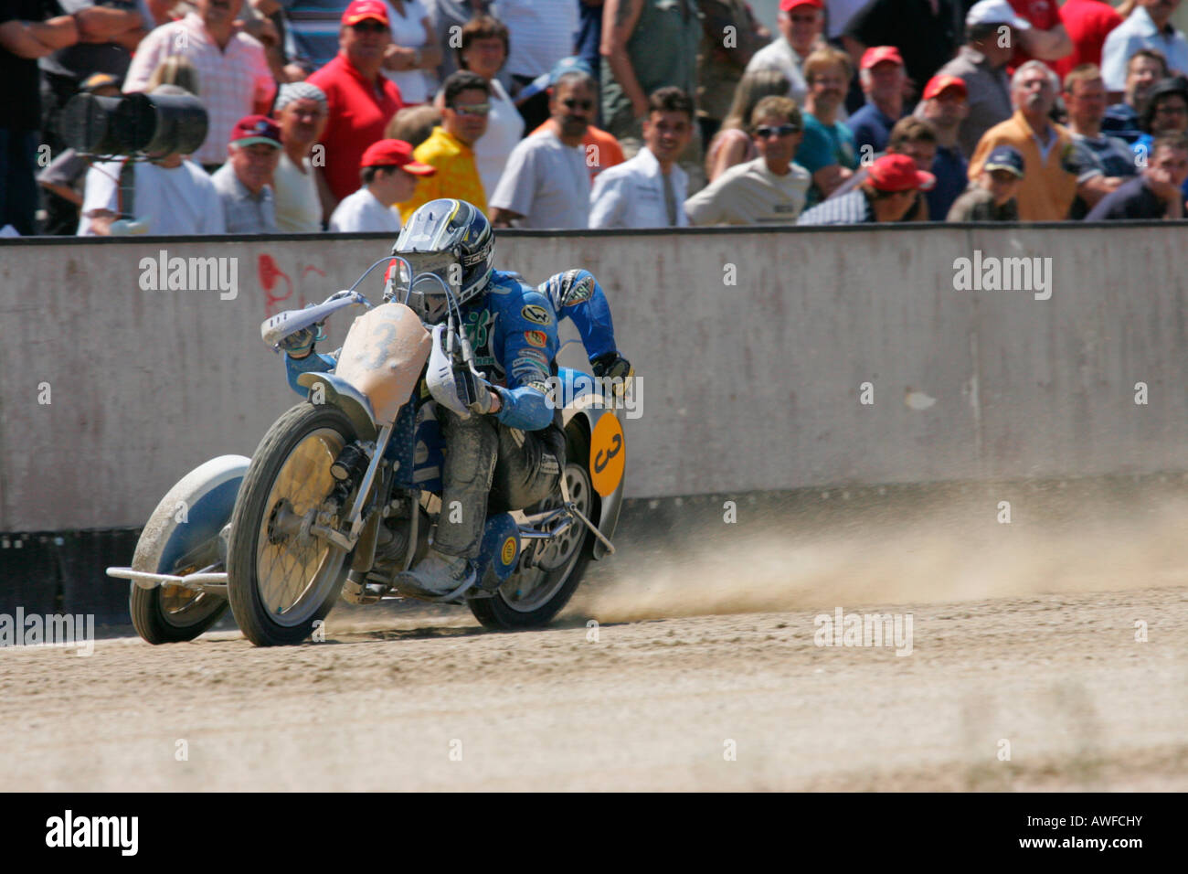 Motorcycle sidecar, international motorcycle race on a dirt track ...