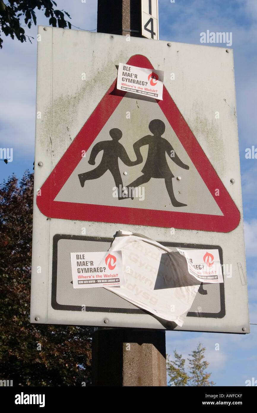 Road warning sign defaced by Welsh language protesters Roath Cardiff UK ...