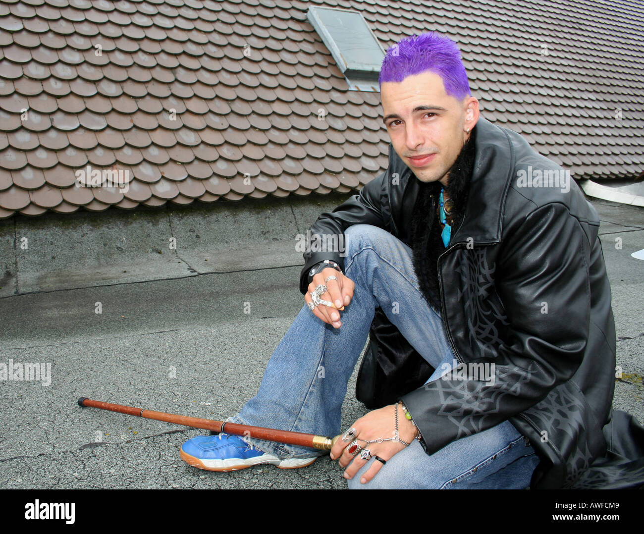 young punk with cigarette posing Stock Photo - Alamy