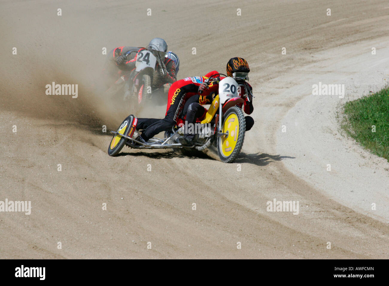 Motorcycle sidecars, international motorcycle race on a dirt track ...