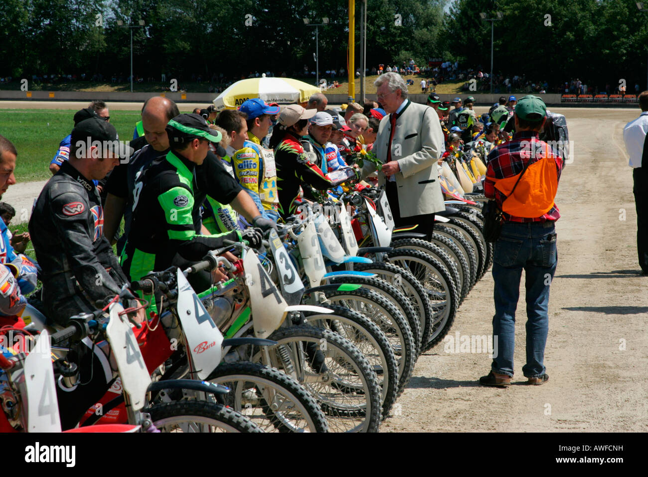 Short track race line-up, international motorcycle race on a dirt track ...