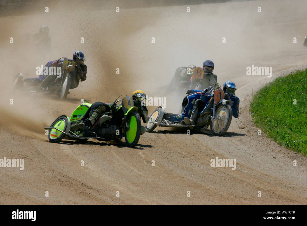 Motorcycle sidecars, international motorcycle race on a dirt track ...