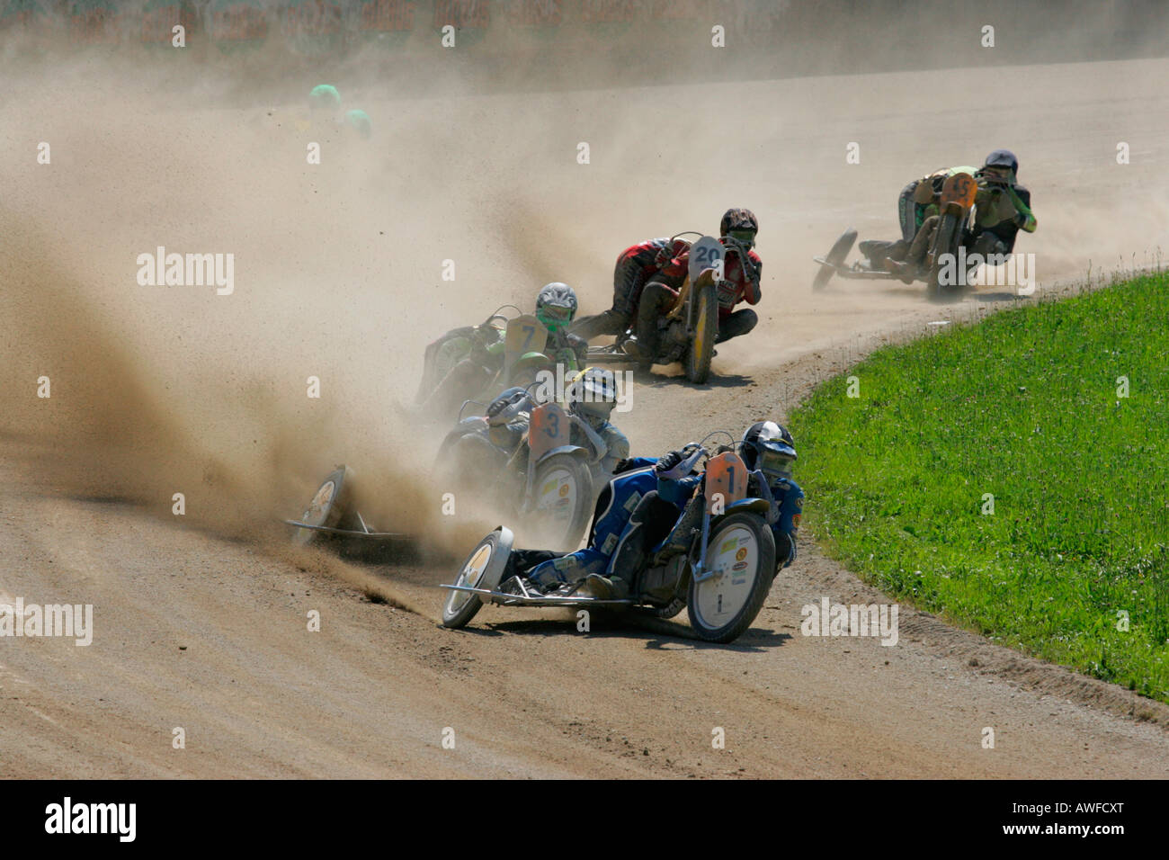 Sidecar motorcycles, international motorcycle race on a dirt track ...