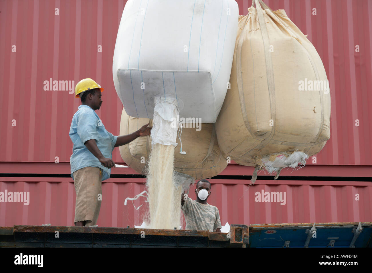 Loading rice sacks hi-res stock photography and images - Alamy