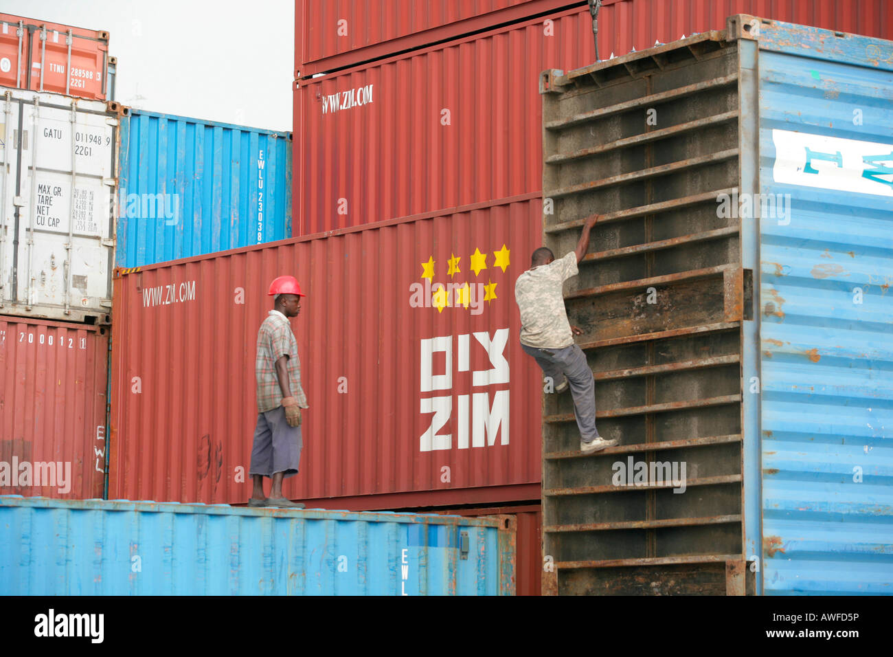 Loading containers at John Fernandes transshipment port in Georgetown ...