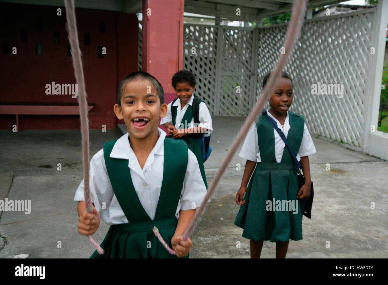 Black kids playing jump rope at school hi-res stock photography and ...